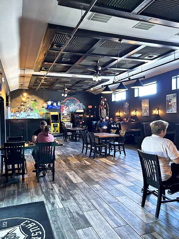 The dining area strikes that perfect balance between medieval hall and modern gastropub, where wooden floors and exposed ceilings create a space for culinary adventures.