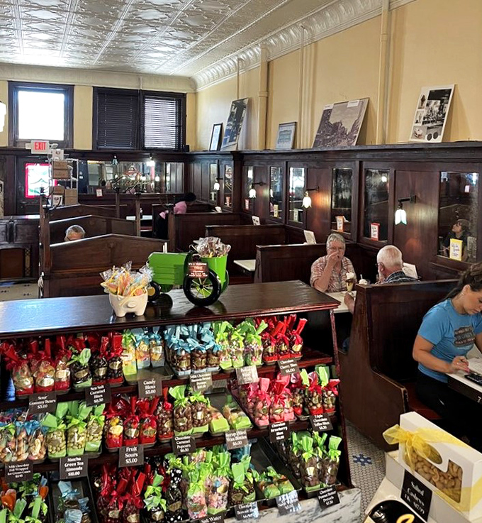 These wooden booths have witnessed countless first dates, family celebrations, and the universal expression of ice cream bliss.
