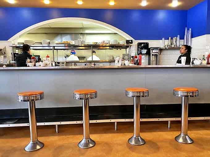 Where coffee magic happens &ndash; the heart of morning rituals and post-meal digestifs in warm wooden surroundings.