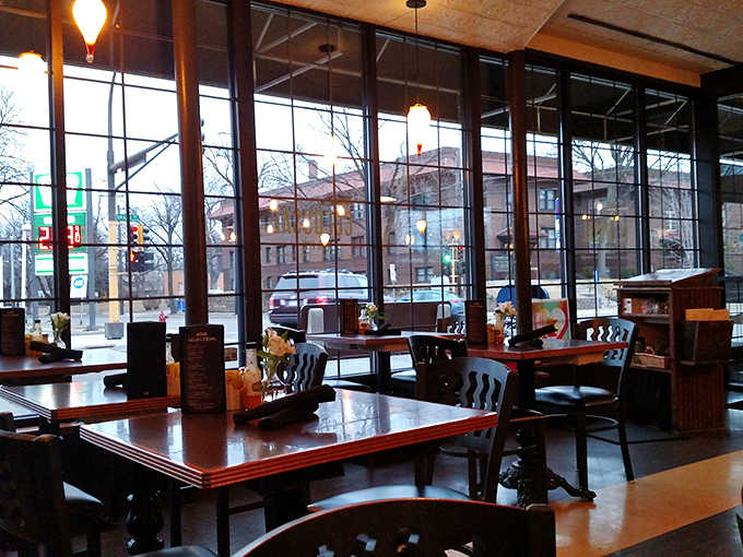 Large windows flood the dining area with natural light, turning an ordinary breakfast into a sun-dappled experience worth lingering over.