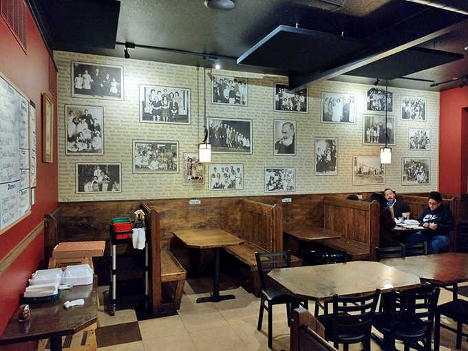 The dining room walls showcase generations of history, creating an atmosphere where every meal feels like being invited into someone's family album.