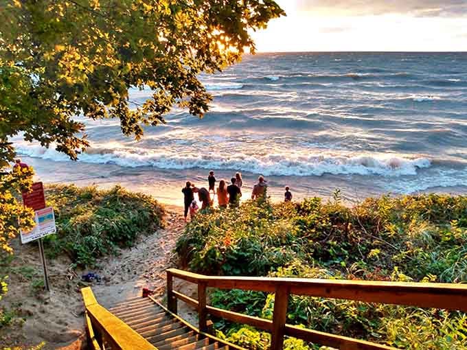 A perfect Michigan sunset moment &ndash; where the day's last light turns ordinary people into silhouettes and everyday worries into distant memories.