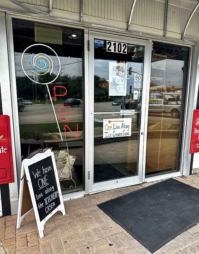 The welcoming storefront invites chocolate lovers in with its charming signage and promise of sweet treasures within.
