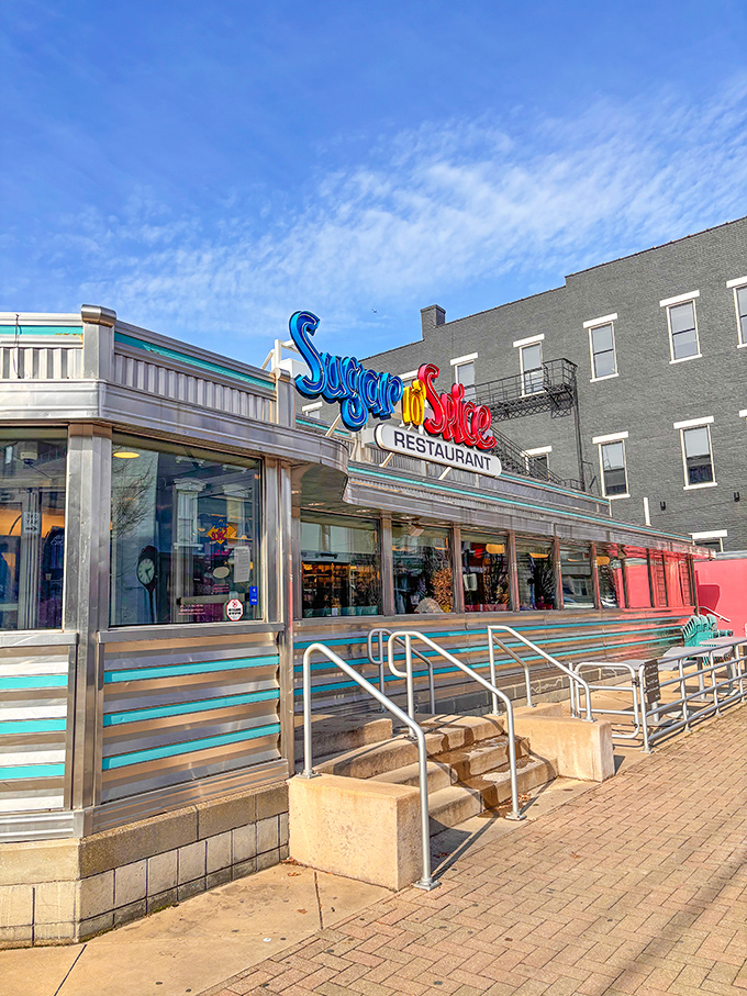 Exterior Another Angle: Morning sunlight plays across the chrome-trimmed fa&ccedil;ade, highlighting the retro charm that makes this diner an architectural standout in OTR.