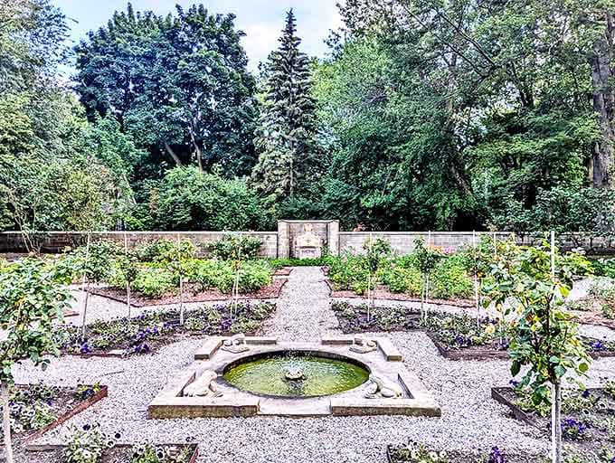 A geometric oasis of tranquility, the formal garden's fountain provides the perfect soundtrack for contemplating life's finer things.