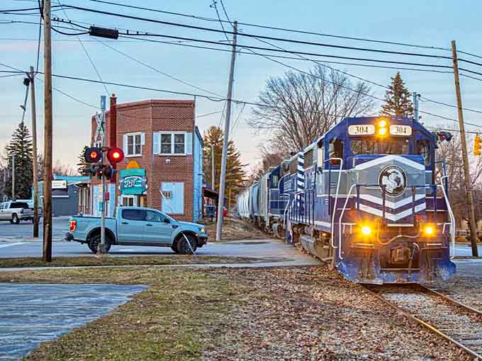 The rhythmic rumble of passing trains still punctuates Harrisville's soundtrack, connecting this small town to the wider world beyond its peaceful shores.
