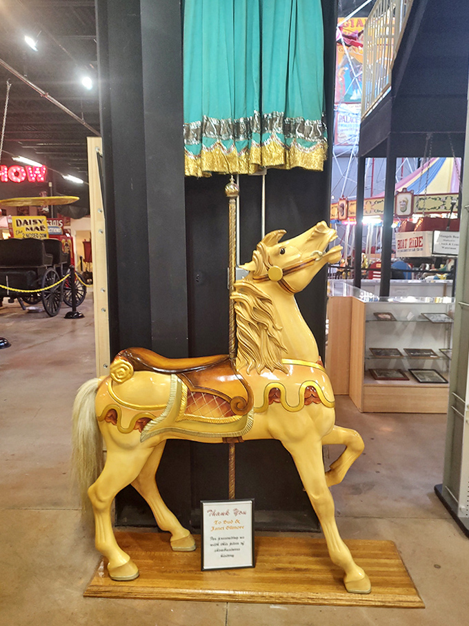 This golden carousel horse seems ready to gallop off its platform &ndash; a testament to craftsmen who carved dreams from wood a century ago.