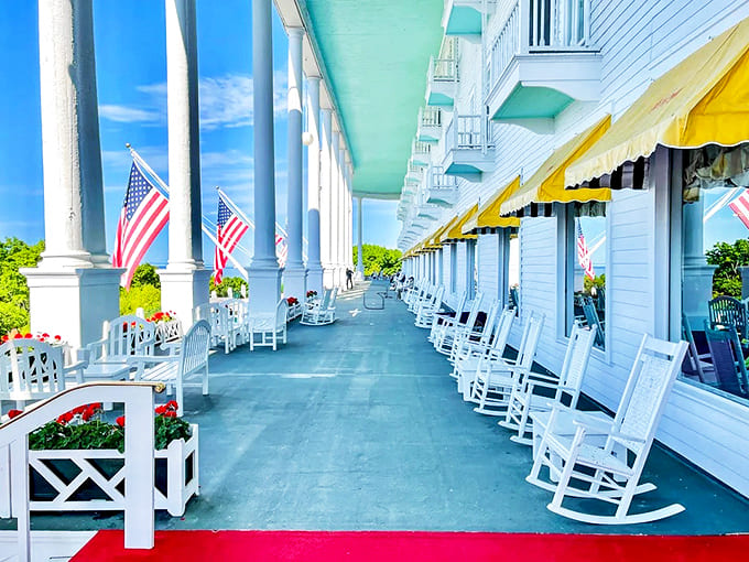 The world's longest porch stretches into the distance, its white rocking chairs inviting guests to slow down and savor the simple pleasure of doing nothing at all.