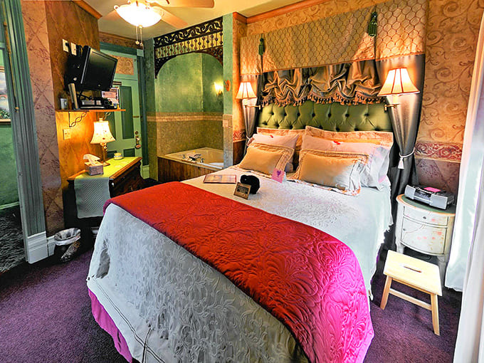 Grandma Bell's Room wraps guests in comfort with its four-poster bed and rich textiles – Victorian luxury with modern amenities.