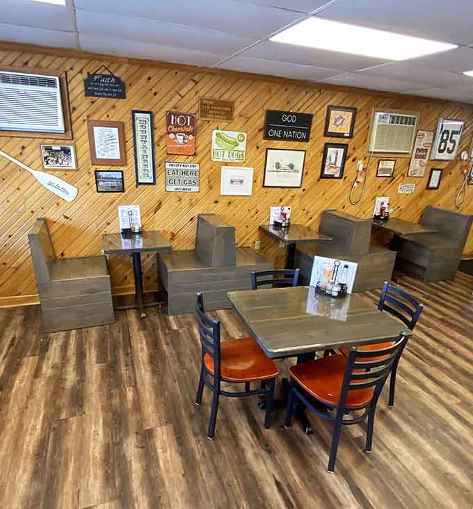 The dining area features comfortable booths and tables where locals gather to share meals and stories in equal measure.