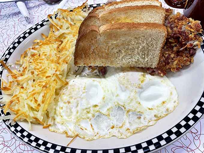 Hash browns so perfectly crispy they deserve their own fan club, paired with eggs that sunny side up your entire day.