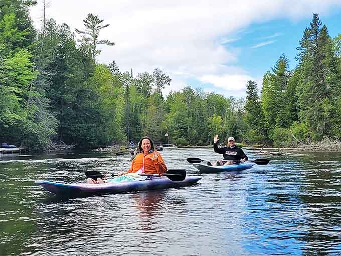 Kayakers glide through the pristine waters of the AuSable River &ndash; nature's highway system, but with better views and no traffic jams.