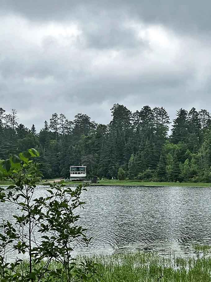 The boathouse stands like a patient fisherman at lake's edge, waiting for visitors to discover the water's secrets.