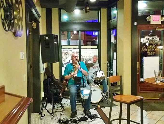 Live music transforms the Riviera from historic theater to vibrant performance space, where every note resonates perfectly in the acoustically designed room.