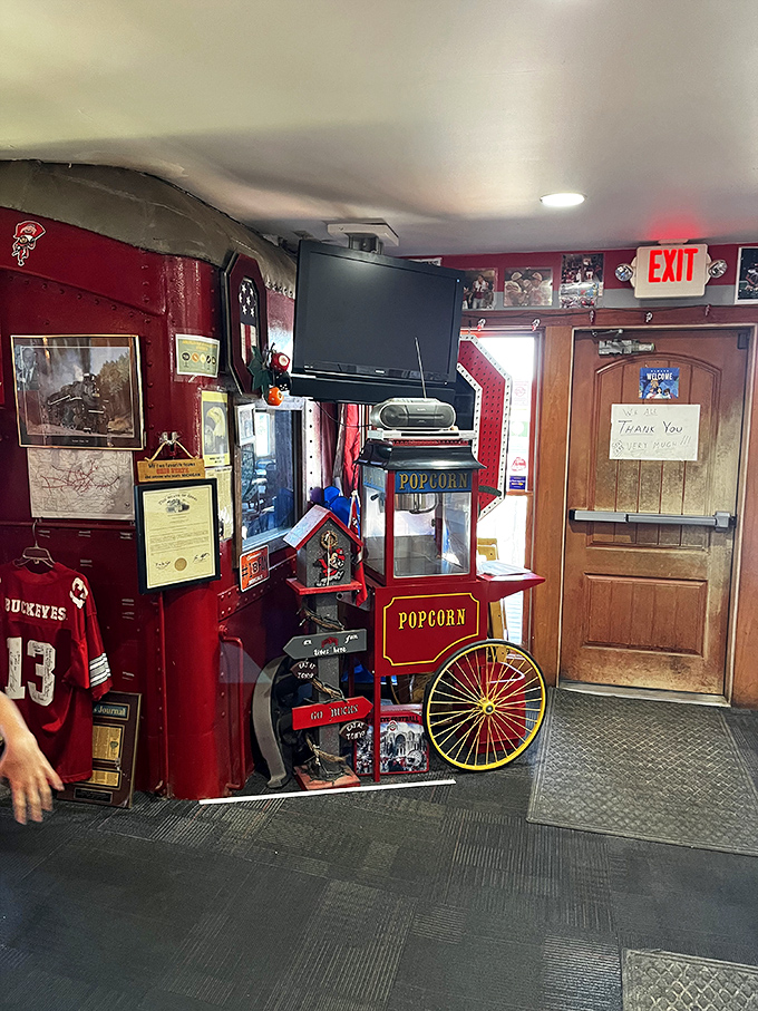Every corner reveals another treasure of OSU memorabilia – even the popcorn machine wears team colors with pride.