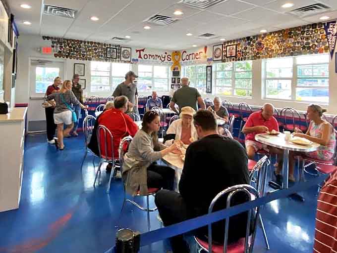 Customers: "Tommy's Corner" buzzes with happy patrons enjoying their frozen treasures &ndash; proof that ice cream creates community one scoop at a time.
