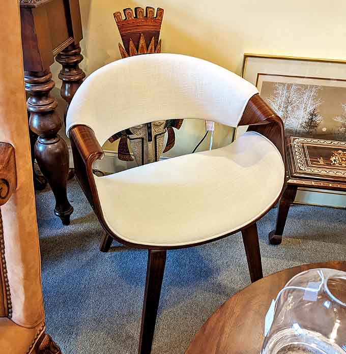 This mid-century dining chair combines form and function so beautifully, you'll find yourself lingering longer at the dinner table.