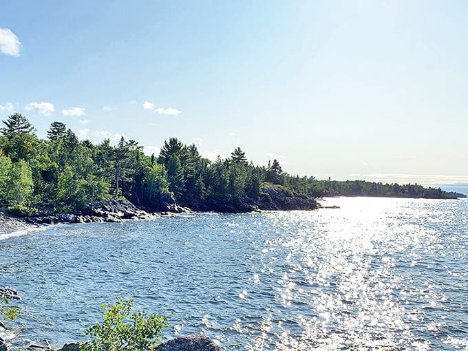Morning light dances across Lake Superior's surface, creating diamonds of reflection that no jewelry store could ever match.
