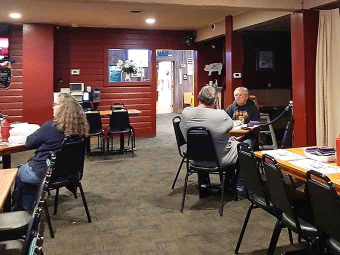 Locals and visitors alike gather around tables where conversations flow as freely as the comfort food.