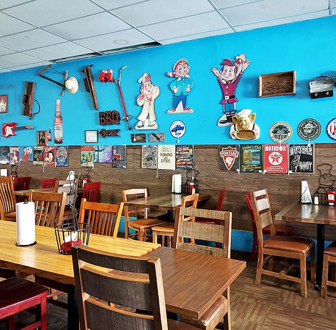 Mismatched chairs and vintage signs create an atmosphere where the only pretension is the pretension of having no pretensions.