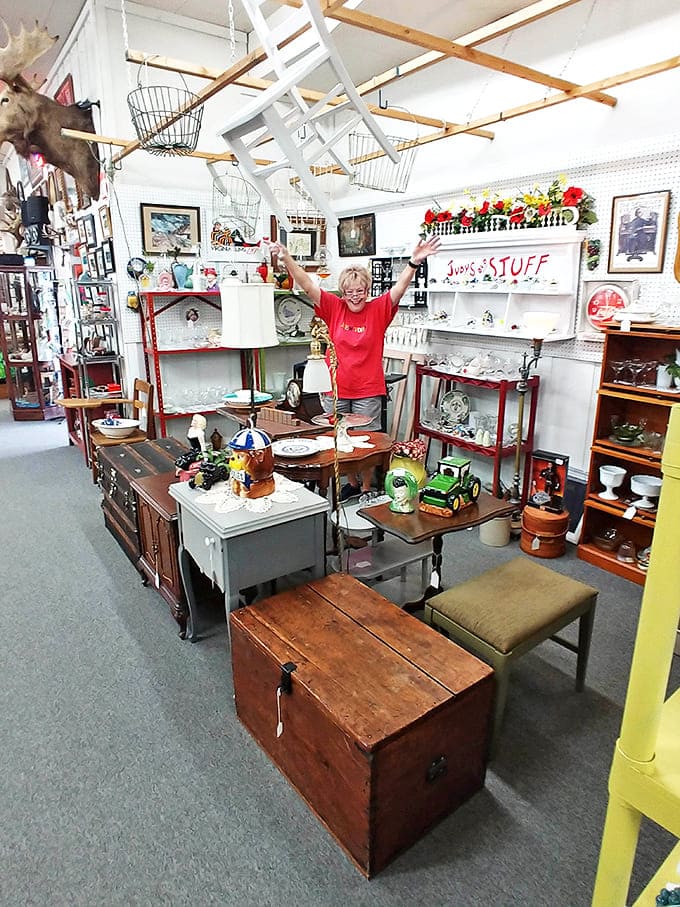 Joy radiates from this booth owner as she showcases her carefully curated collection. Her enthusiasm for these treasures is as vintage as the items themselves.