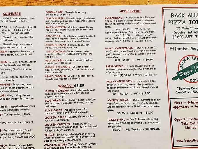 Their extensive menu covers everything from classic pies to creative specialty pizzas, plus grinders and wraps for those rare "not in a pizza mood" days.
