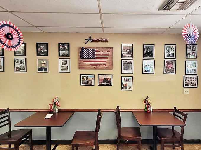 Patriotic d&eacute;cor and family photos line the walls, creating a community atmosphere where locals gather for more than just great sandwiches.
