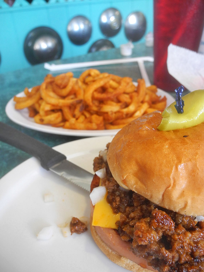 That burger and those curly fries are having a better day than most people, and you're about to join their party.