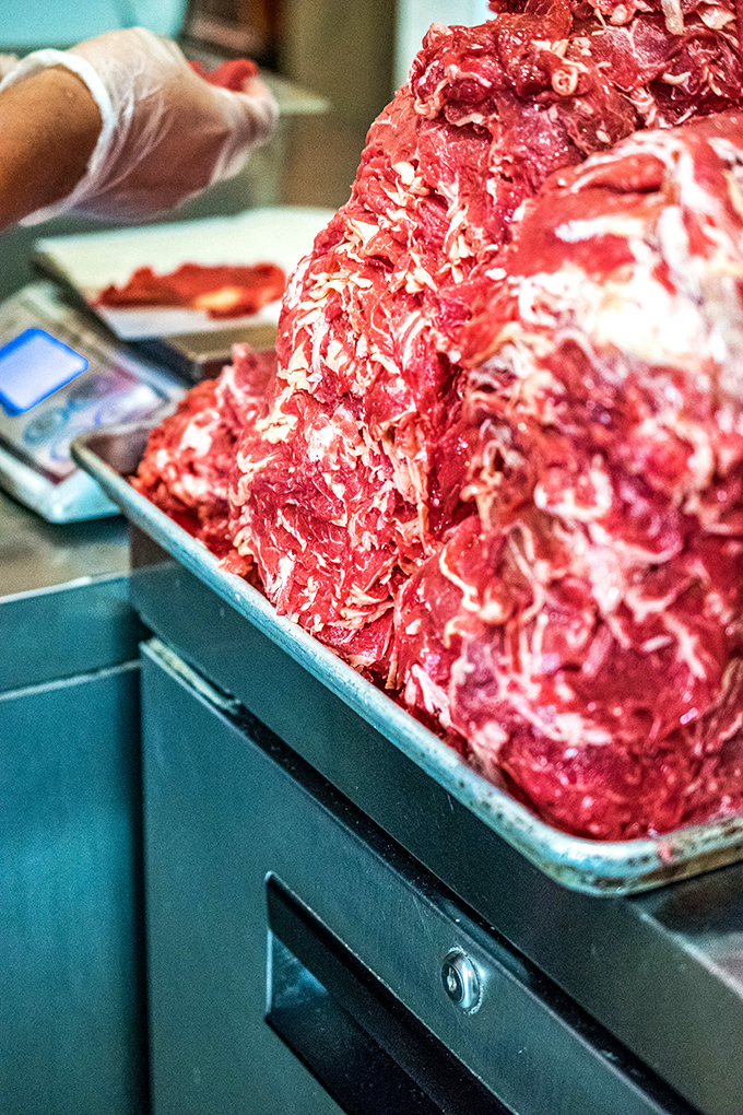 Sliced Beef: The foundation of greatness—fresh-sliced beef waiting for its transformation. Raw potential in its most delicious form.