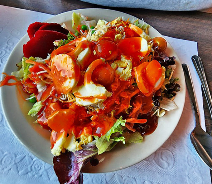 Not just a prelude to the main event, this fresh, colorful salad would be a highlight at lesser establishments.