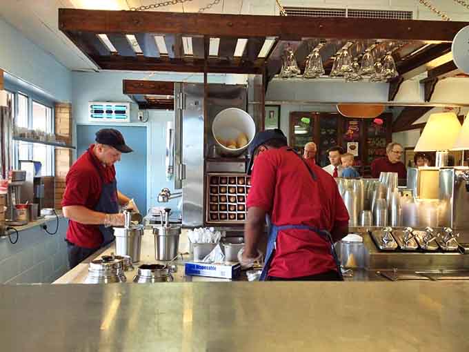 Behind the counter magic &ndash; Sherman's staff crafting frozen masterpieces with the precision and care that comes from genuine passion.