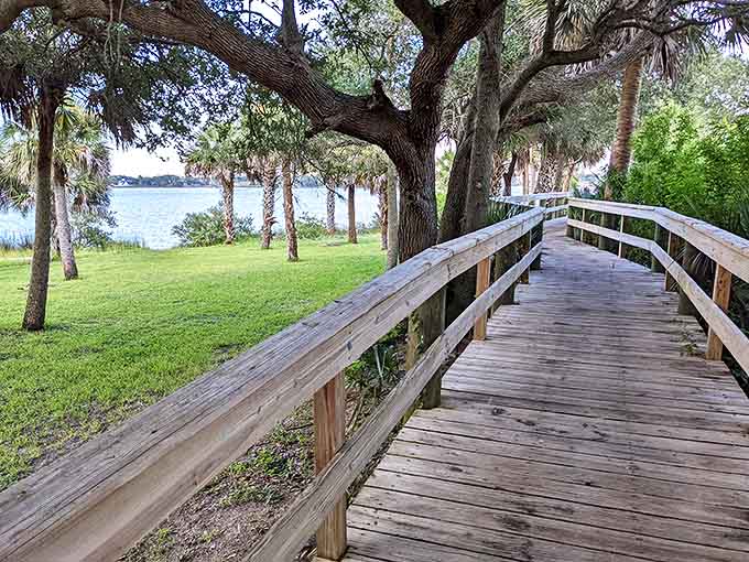 Wooden walkways wind through coastal vegetation, connecting visitors to pristine natural areas that showcase Florida's diverse ecosystems.