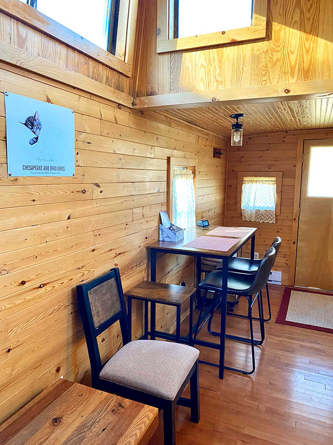 The living area's futon offers daytime lounging and nighttime dreaming &ndash; the perfect spot to contemplate life's journeys, both literal and figurative.