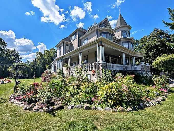 The Cherry Tree Inn's Victorian splendor bursts with colorful gardens, offering guests the rare chance to literally wake up in a movie location.