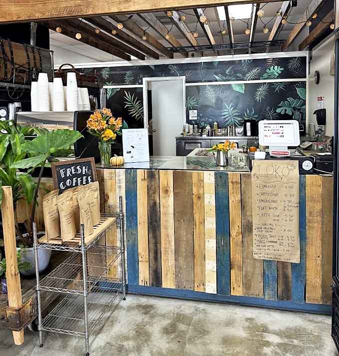 Reclaimed wood and tropical wallpaper create a barista station that's both functional and beautiful, where coffee wizardry happens before your eyes.