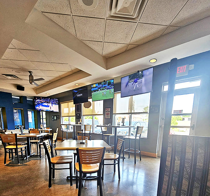 Multiple screens ensure sports fans won't miss a moment of the game while tackling their towering burger creations.