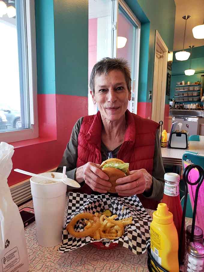 Every booth and table in this diner whispers stories of road trips past while creating space for new memories to unfold.