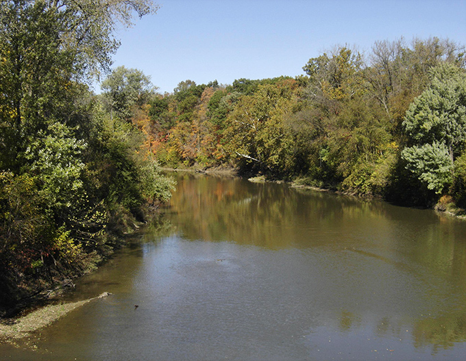 The Vermilion River winds through the landscape like a living timeline, connecting natural beauty with the region's rich historical heritage.