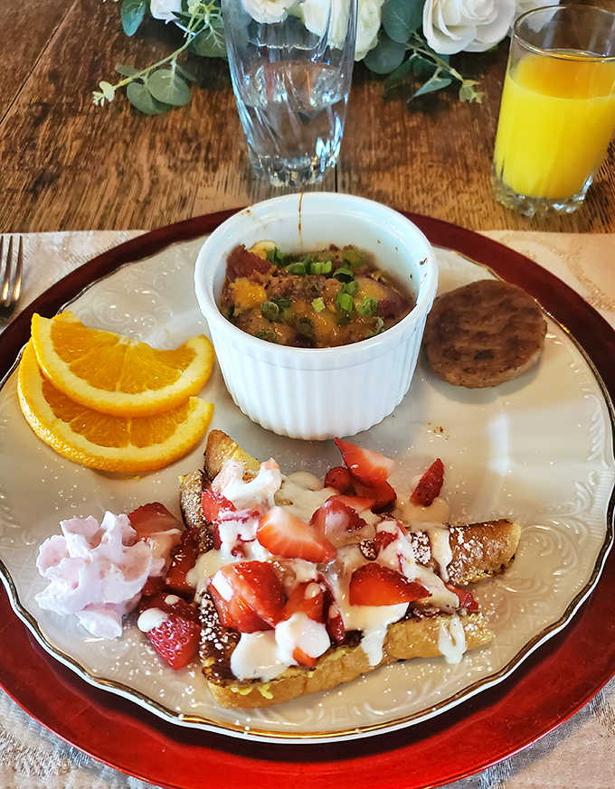 A breakfast symphony of savory egg souffl&eacute;, fresh fruit, and French toast that makes hotel continental breakfasts weep with inadequacy.