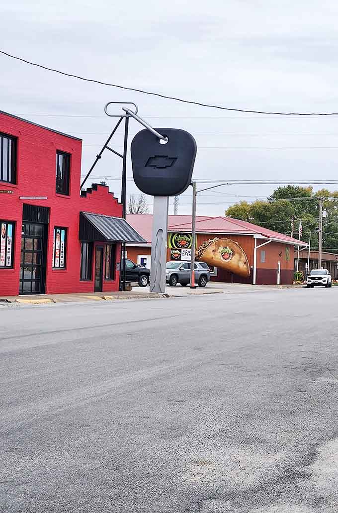 The red brick building provides the perfect backdrop for this silver monument to automotive excess and small-town creativity.
