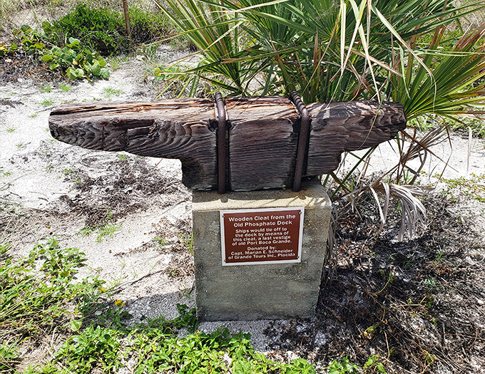 This preserved wooden cleat, once part of the busy phosphate dock, now serves as a tangible link to Boca Grande's industrial past.