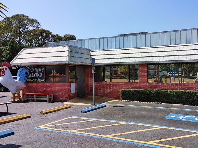 The exterior view from the parking lot, where that giant chicken has witnessed countless breakfast pilgrimages.