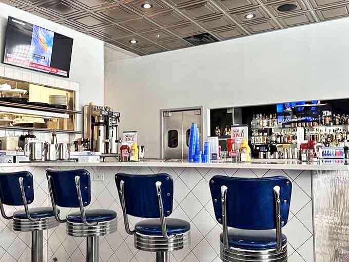 The bar area offers a front-row seat to milkshake artistry and coffee refills that arrive with almost supernatural timing.