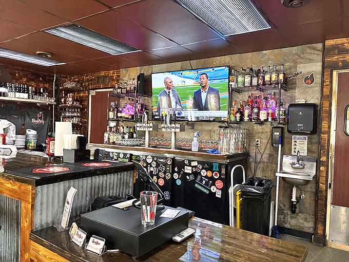 The bar area invites lingering conversations over craft beers, with tap handles standing at attention like soldiers ready to serve thirsty patrons.