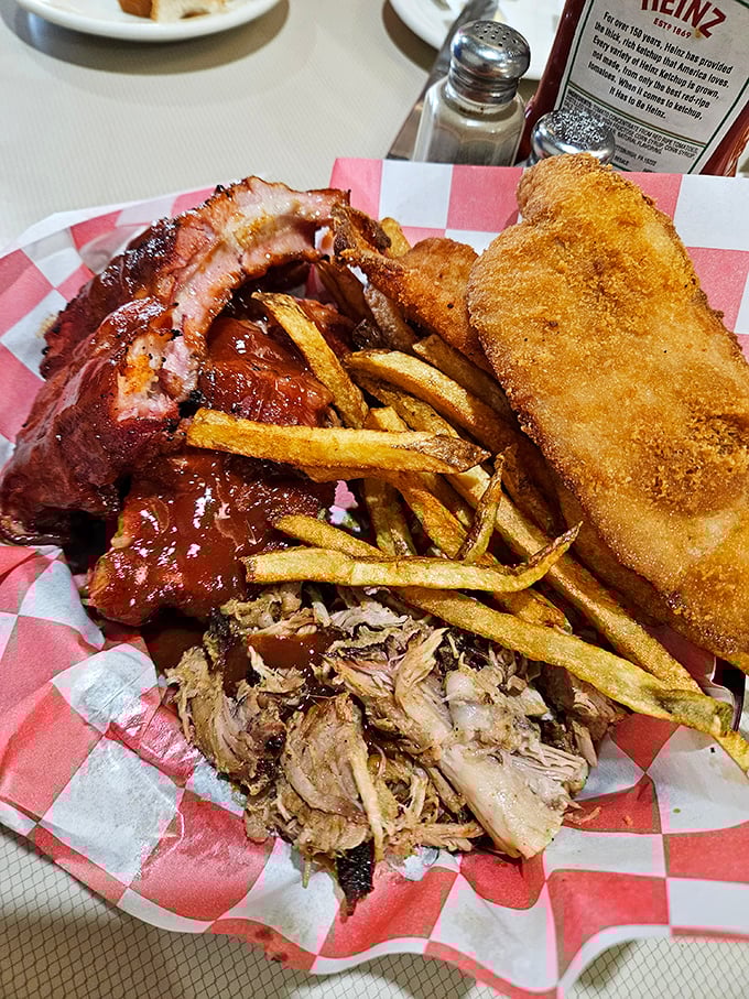 A carnivore's dream plate featuring perfectly smoked meats &ndash; the barbecue offerings prove Village Inn isn't just a one-trick chicken pony.