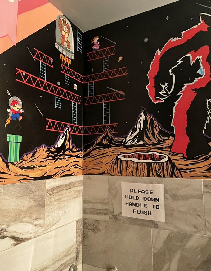 Even the bathroom continues the theme &ndash; that Donkey Kong mural turns an ordinary restroom break into another gaming experience.