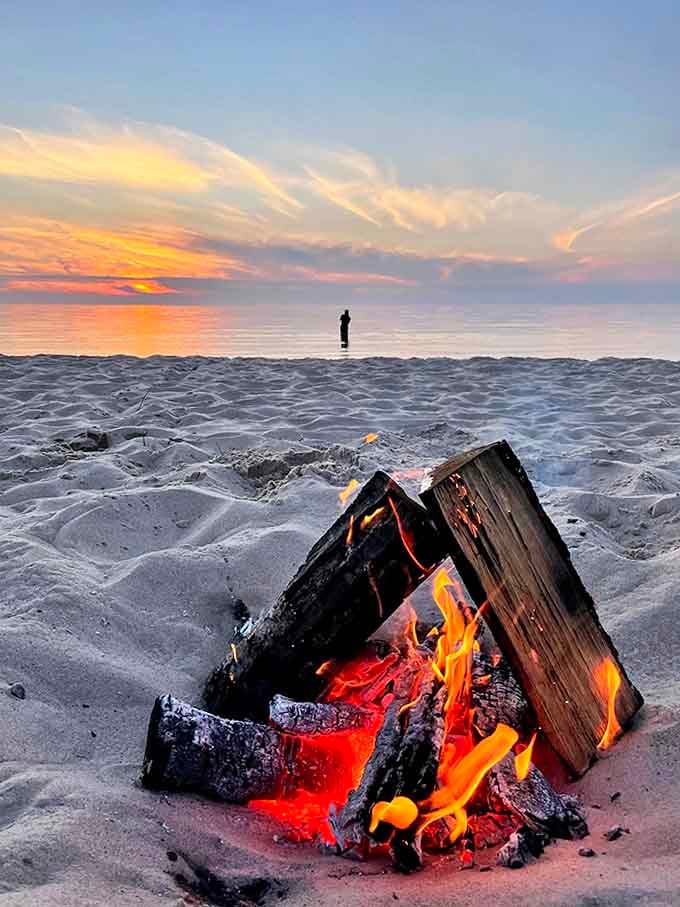 Evening beach bonfires create the perfect end to a day of adventure, with flames dancing against the backdrop of twilight waters.