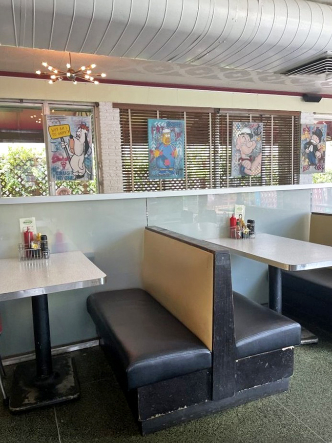 Vintage-inspired booths and pop art create Howley's unique atmosphere &ndash; where retro charm meets contemporary cool in perfect balance.