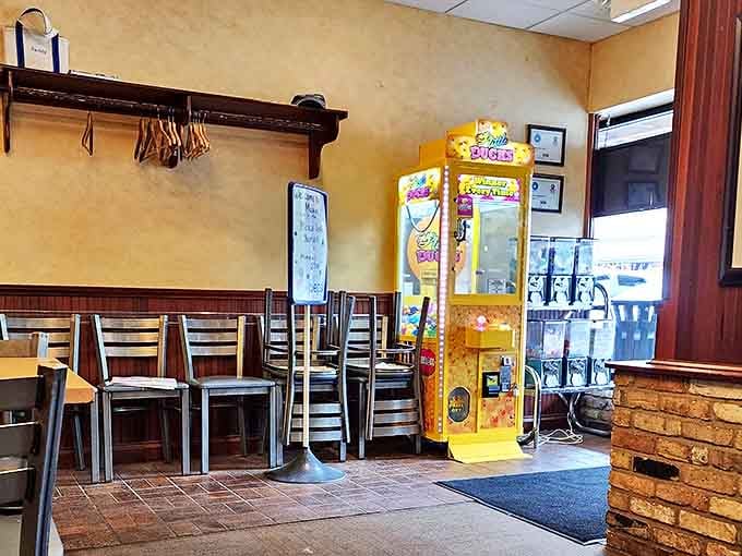 The claw machine near the entrance stands as a whimsical sentinel—where children's hopes of winning a stuffed friend have remained unchanged for decades.