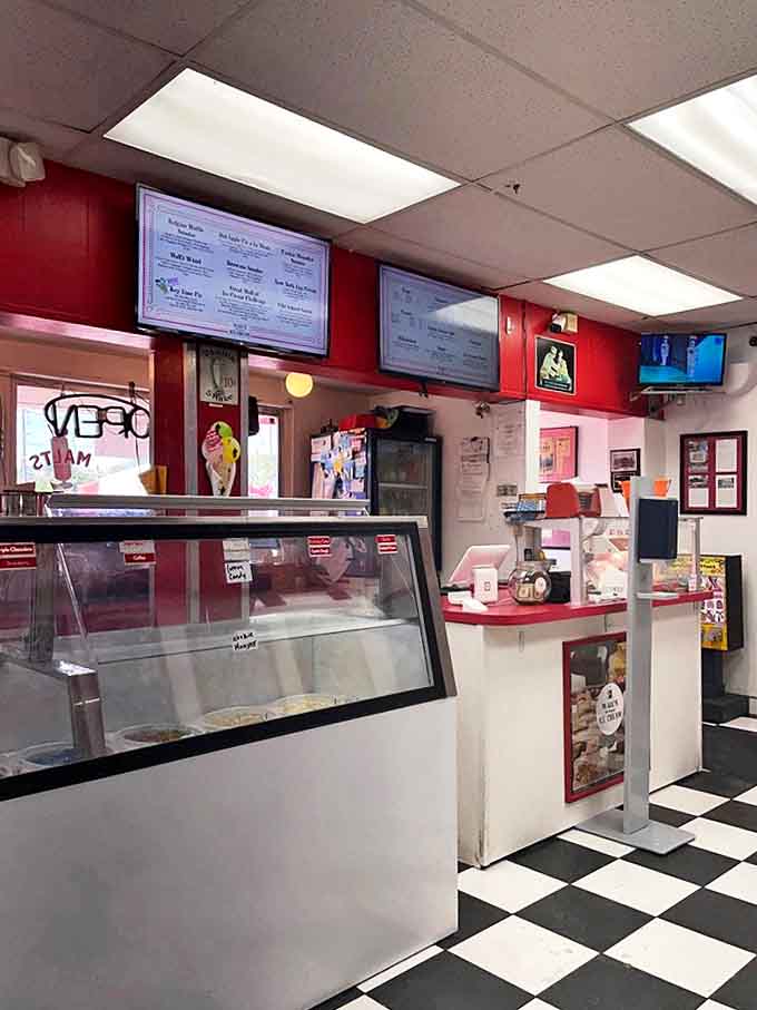 At the counter, glass display cases reveal frozen treasures while the red and white color scheme continues the sweet Americana theme.